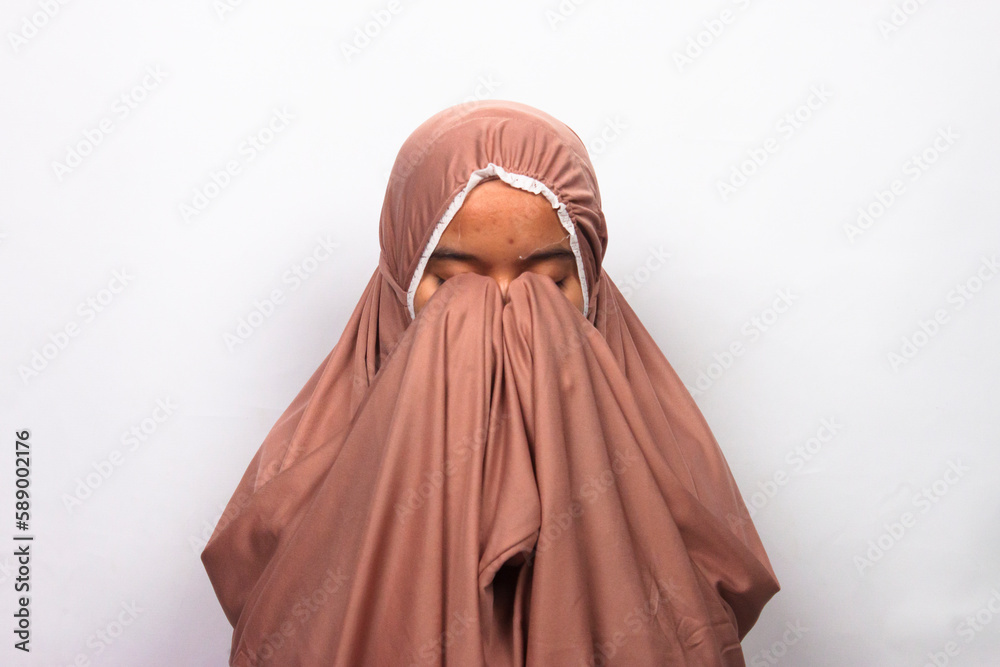 Islamic moslem woman praying wearing traditional dress Stock Photo ...