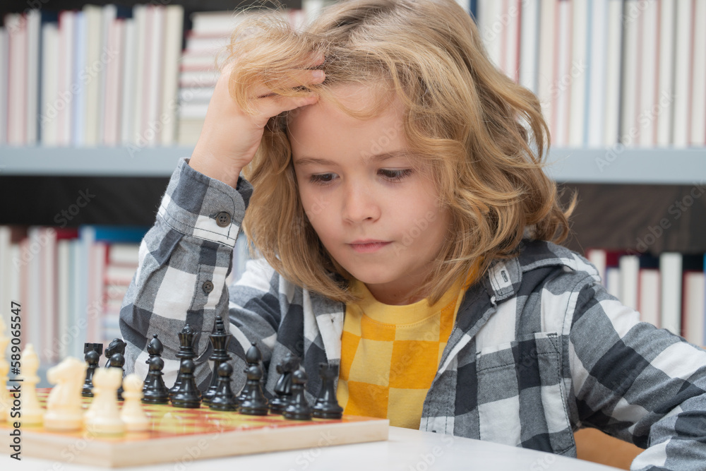 Chess school. Little kid play chess. Thinking child. Chess game for ...