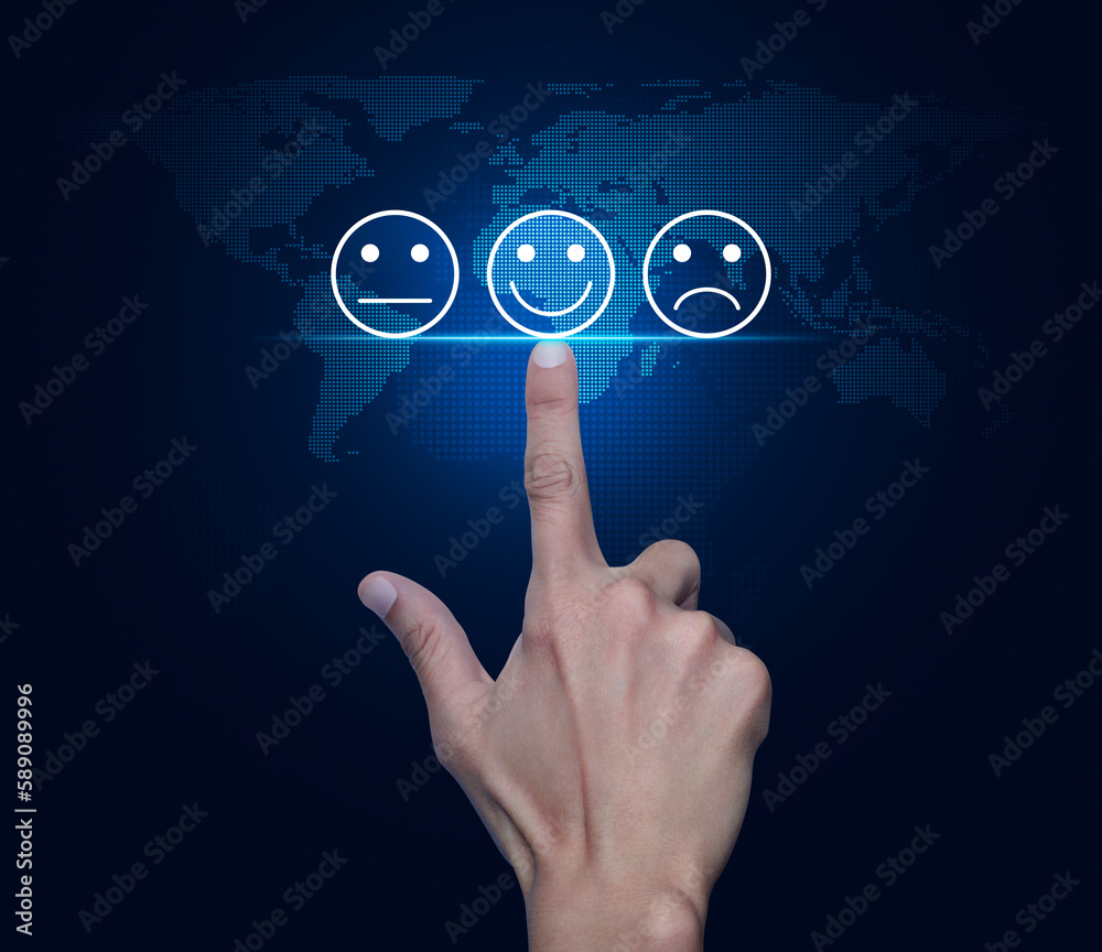 Foto de Hand pressing excellent smiley face rating icon over digital ...
