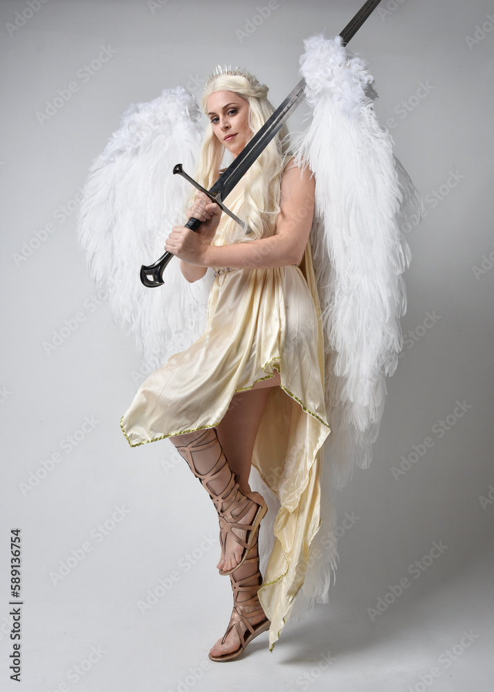 Full length portrait of beautiful blonde woman wearing a fantasy ...