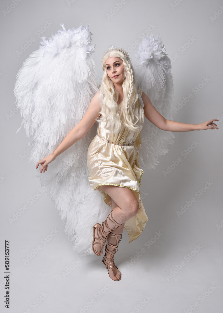 Full length portrait of beautiful blonde woman wearing a fantasy ...