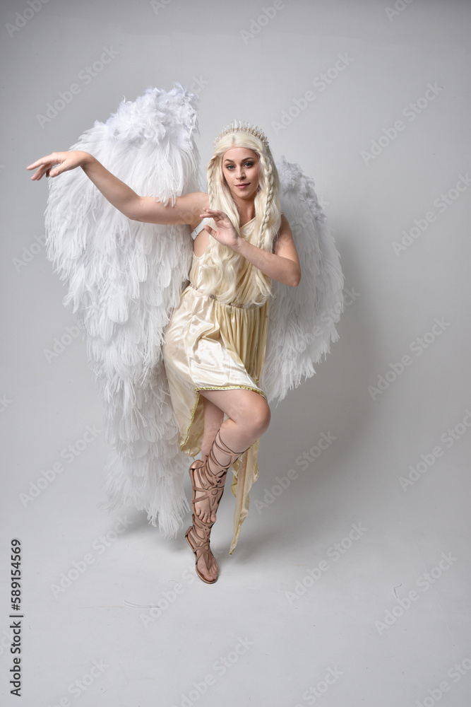 Full length portrait of beautiful blonde woman wearing a fantasy ...
