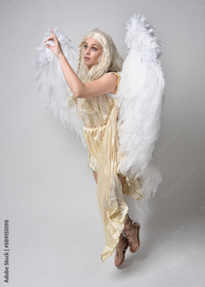 Full length portrait of beautiful blonde woman wearing a fantasy ...