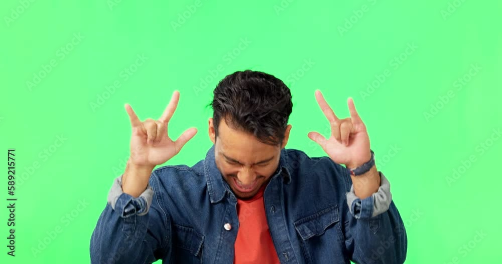 Vídeo do Stock: Face of a man with a rock gesture by green screen ...