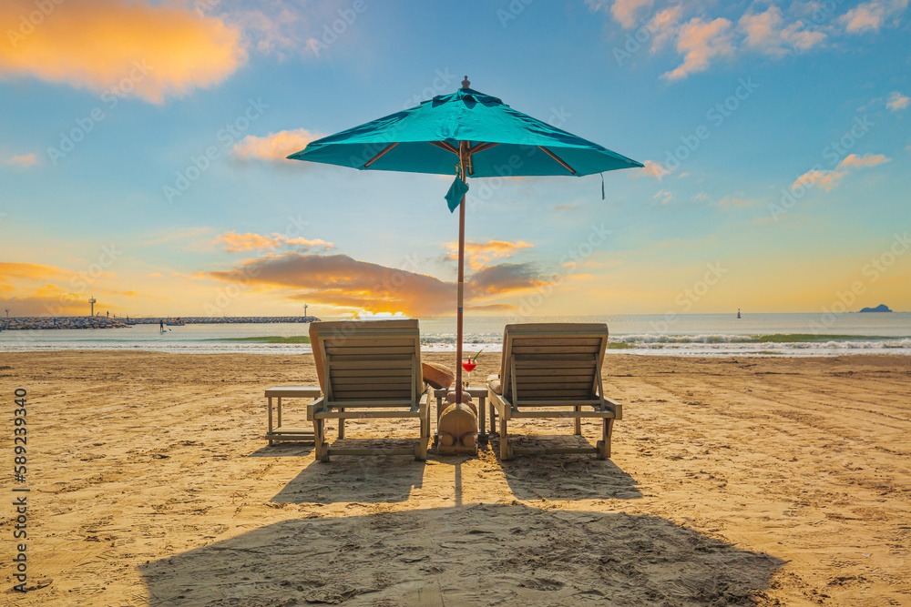 Beaches and sun tables in Thailand,Row of empty sun loungers and orange ...