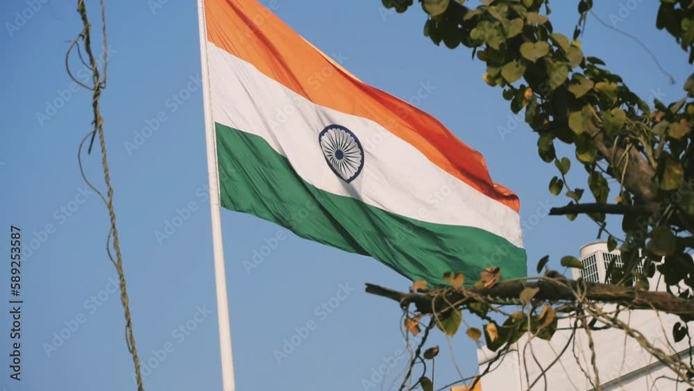 India flag flying high at Connaught Place with pride in blue sky, India ...
