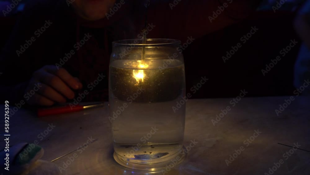 Experience with a burning sparkler under water. Wrapped a sparkler ...