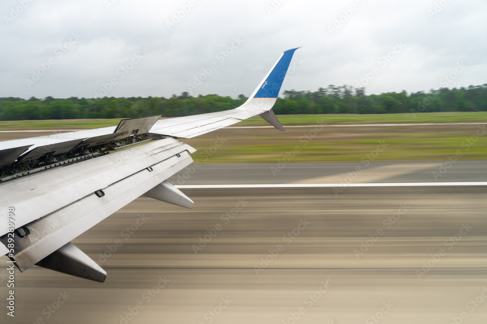 airplane taking off on the runway at the airport Stock Photo | Adobe Stock