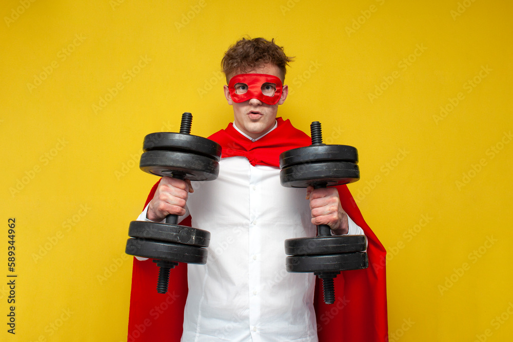 Zdjęcie Stock: superman with super strength and superpowers holds heavy ...