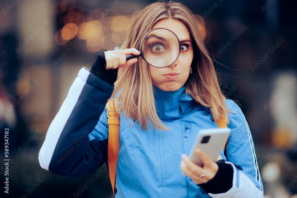 Funny Woman Searching the Internet on her mobile Phone. Girl checking ...