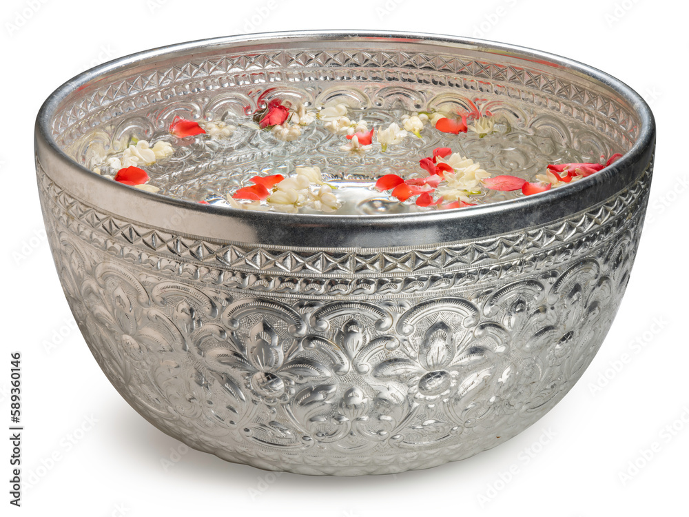 Silver metal bowl filled with water and jasmine flowers for Songkran ...
