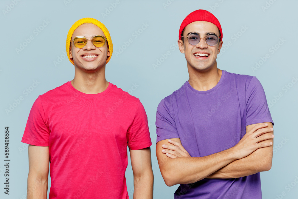 Young smiling satisfied stylish cheerful fun couple two friends men ...