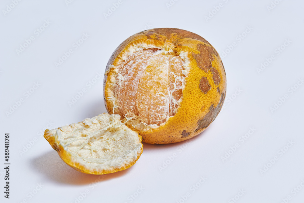 Imperfect or bad skin organic orange which skin partly peeled open ...
