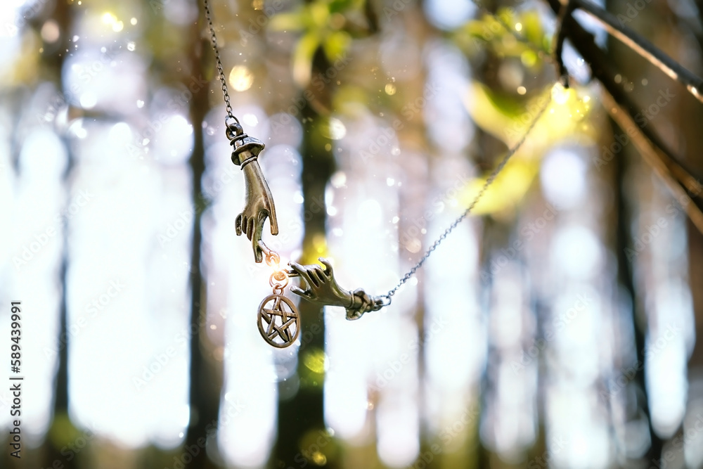 Fotka „witch wiccan amulet with pentacle on tree branch, blurred ...