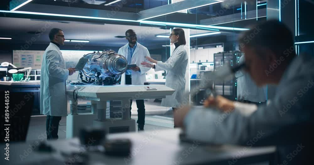 Rack Focus Switching from an Engineer Using Microscope to Propulsion ...