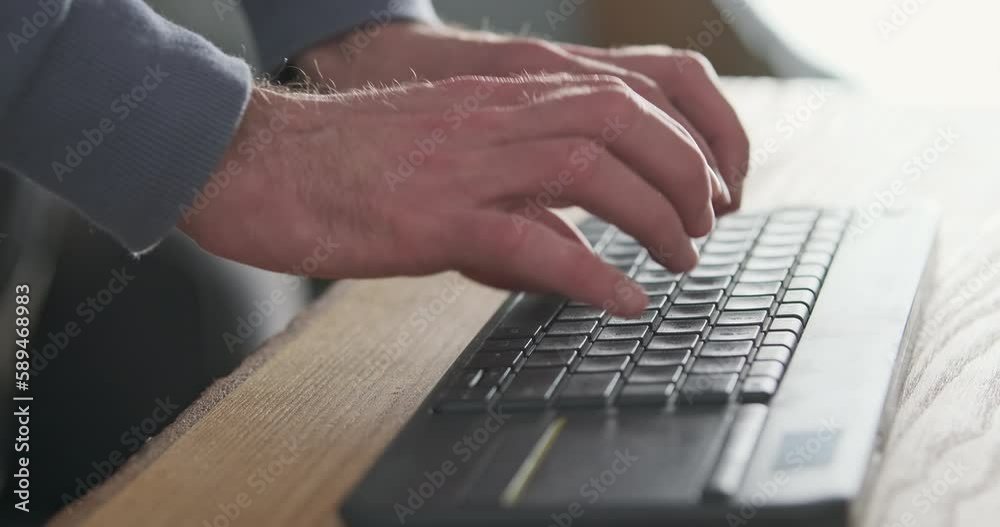 Copywriter typing text on keyboard, close-up, side view. Standing work ...