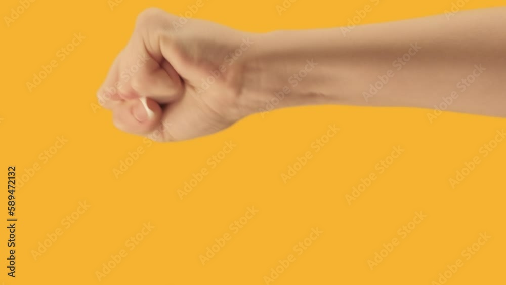 Vertical video. Protest fist. Strike demonstration. Female activist ...