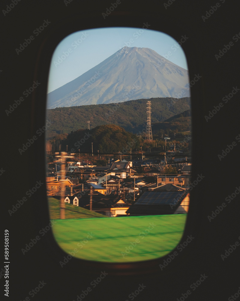 View of Mount Fuji from the window of a moving Shinkansen bullet train ...