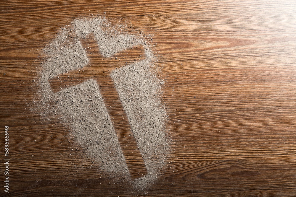 Symbol cross of ashes on wood background Stock Photo | Adobe Stock