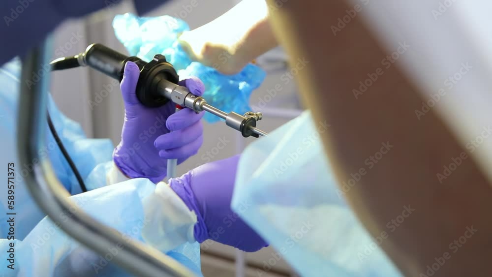 Gynecological chair. Office hysteroscopy. A woman at the gynecologist ...