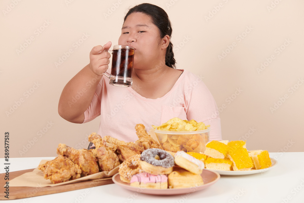 obesity young women binge eating disorder concept with woman eating ...
