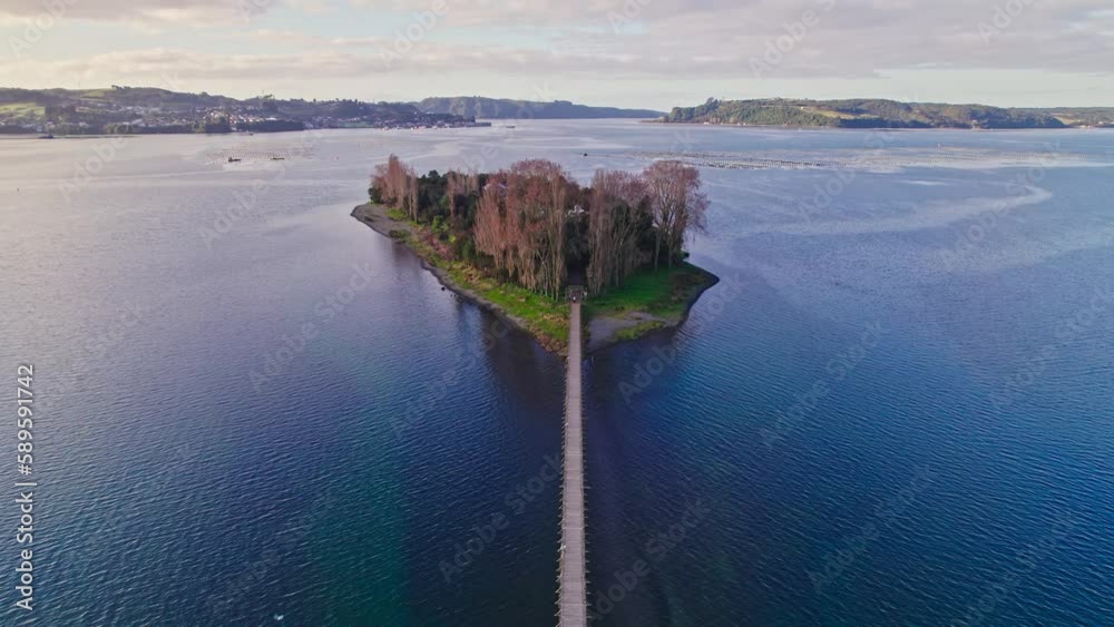 Isla Aucar in Chiloe, Chile. Aerial shot by drone at golden hour before ...