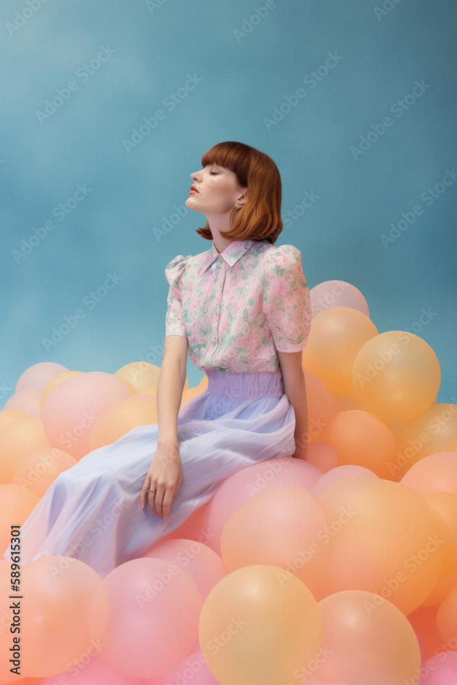 Portrait of a young cute girl at a balloon party, summer pastel concept ...