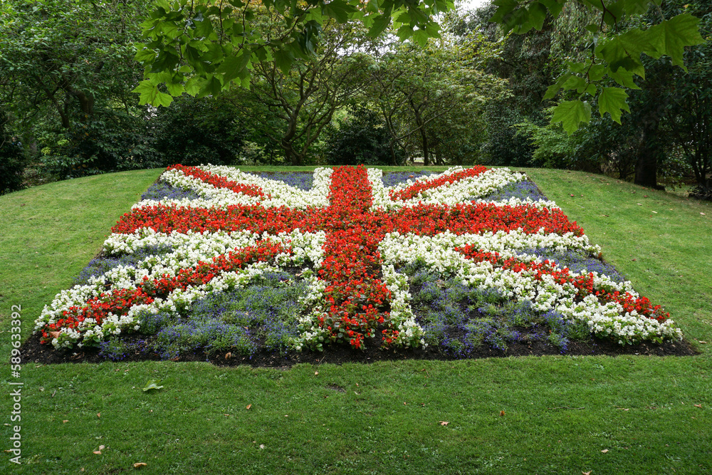 flag of Great Britain in flower bed. park flowers in shape of the union ...