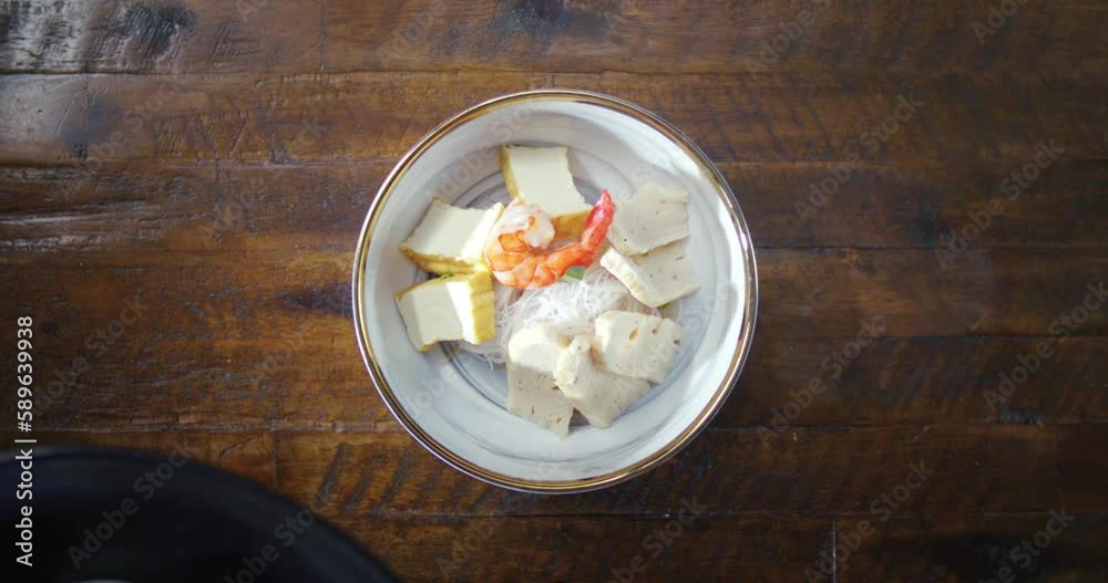 Top View The Making of Laksa: Noodles, Tofu, Fish Cake, Shrimp and ...