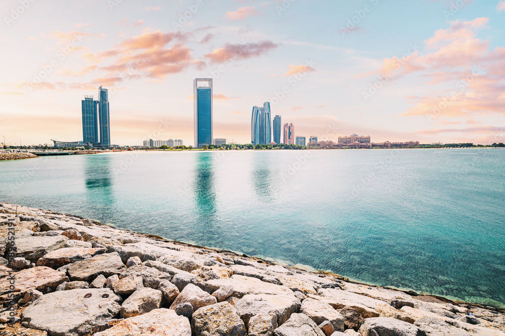 towering skyscrapers that dot Abu Dhabi's seaside shore. These ...
