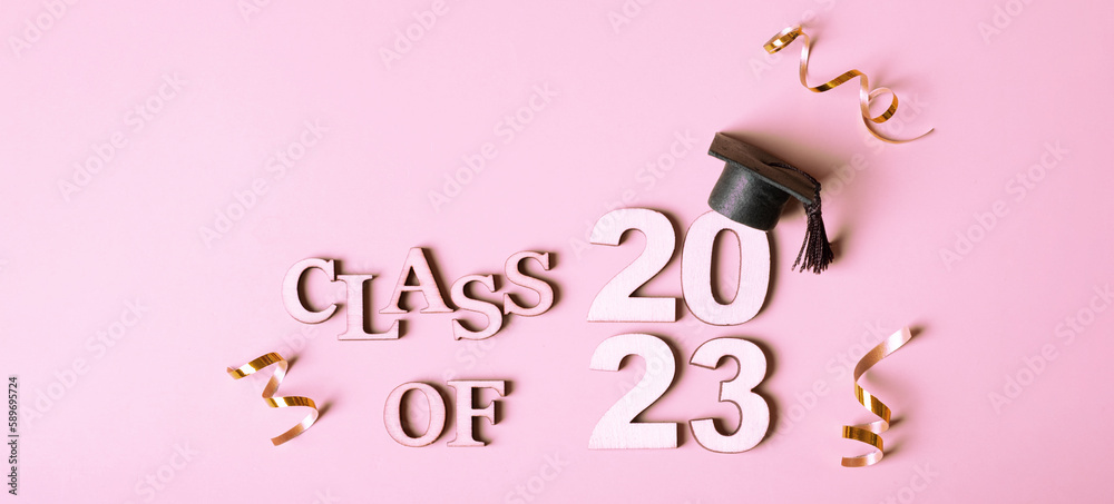 Class of 2023 concept. Wooden number 2023 with graduated cap on pink ...