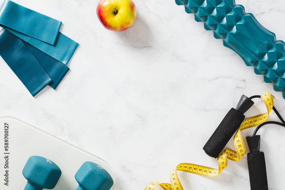 Fitness equipment on marble background with copy space. Gym, workout ...