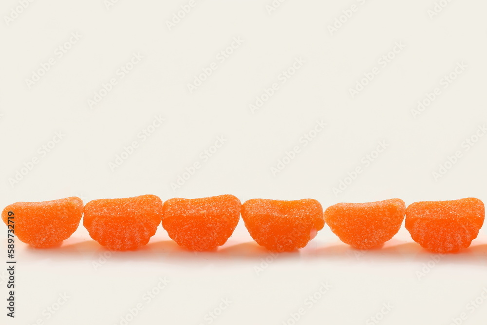 sweet orange flavored sugar candy texture seamless in white background ...