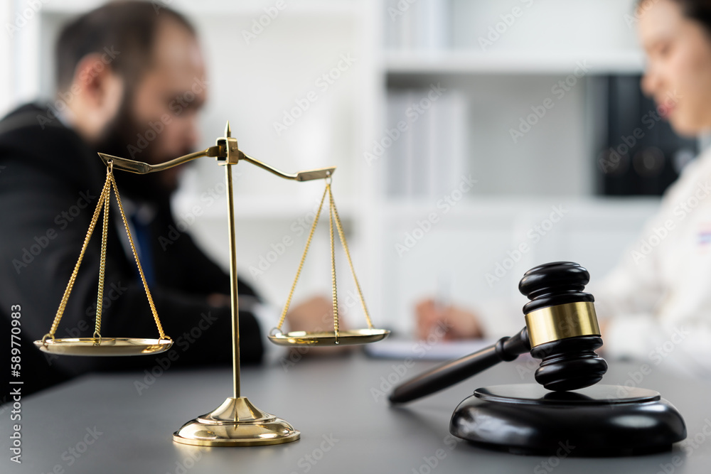 Focus shiny golden balanced scale on blurred background of lawyer ...