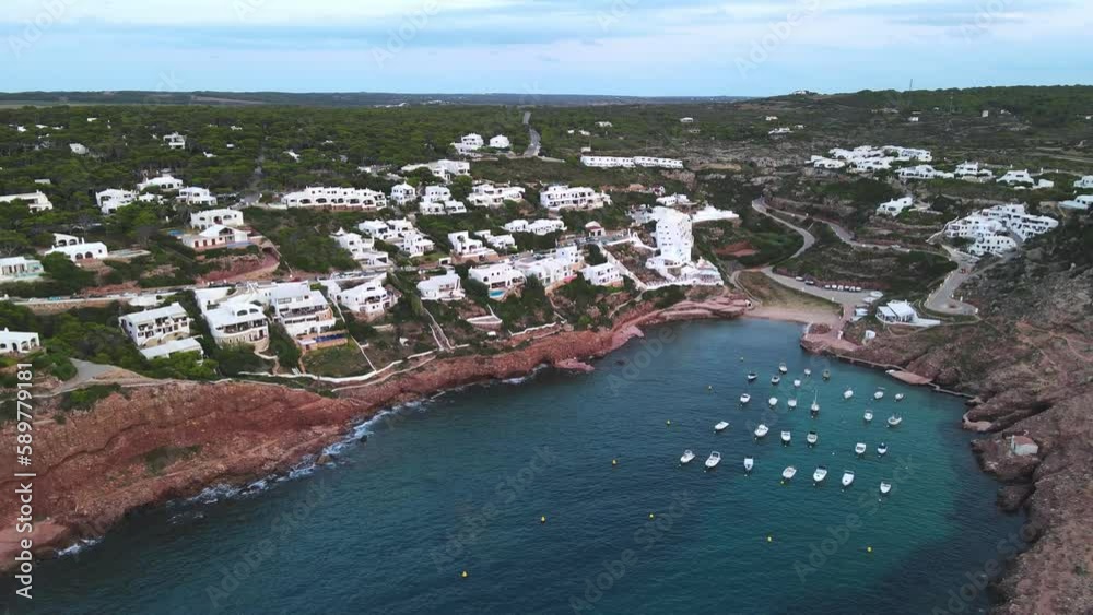Luxury real estate on the side of cliff top in Menorca Spain with ...