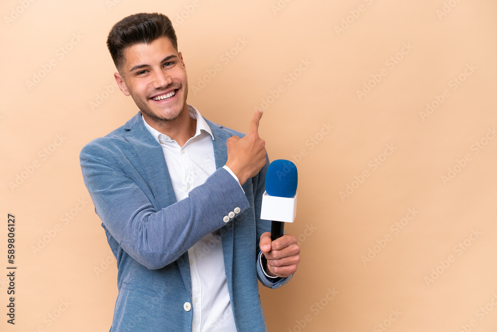 Young caucasian TV presenter man isolated on white background pointing ...
