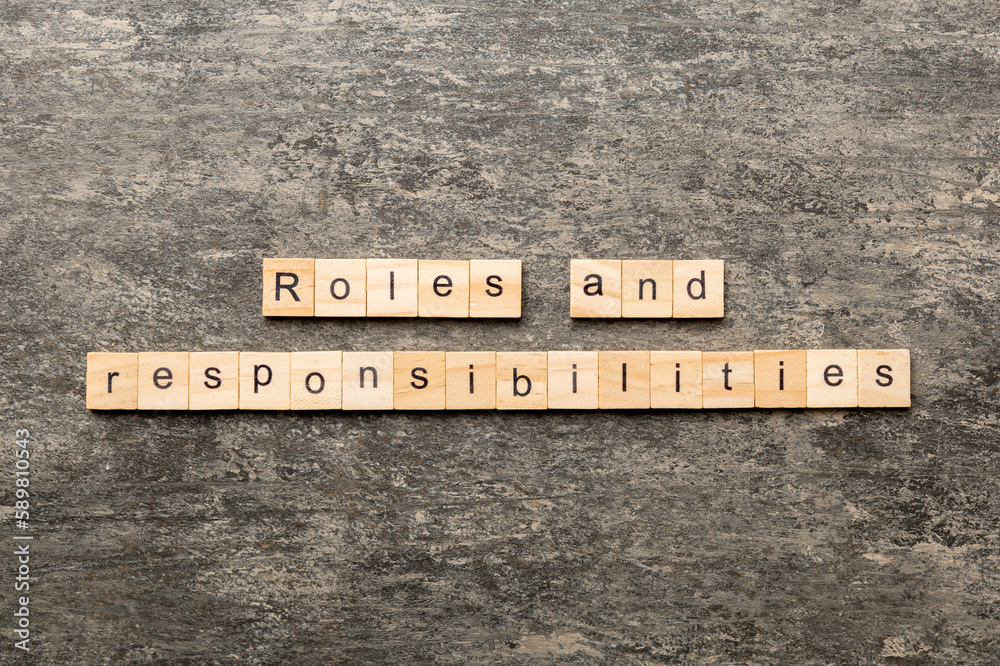 roles and responsibilities word written on wood block. roles and ... roles and responsibilities word written on wood block. roles and ...