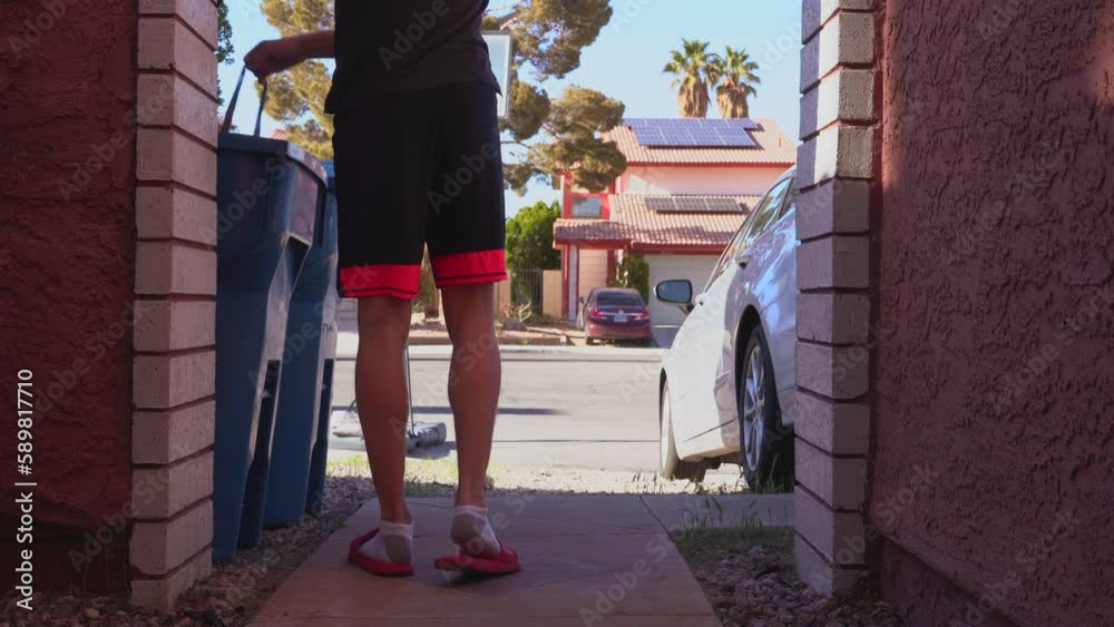 Man throwing garbage in the trash can. Separation of waste into waste ...