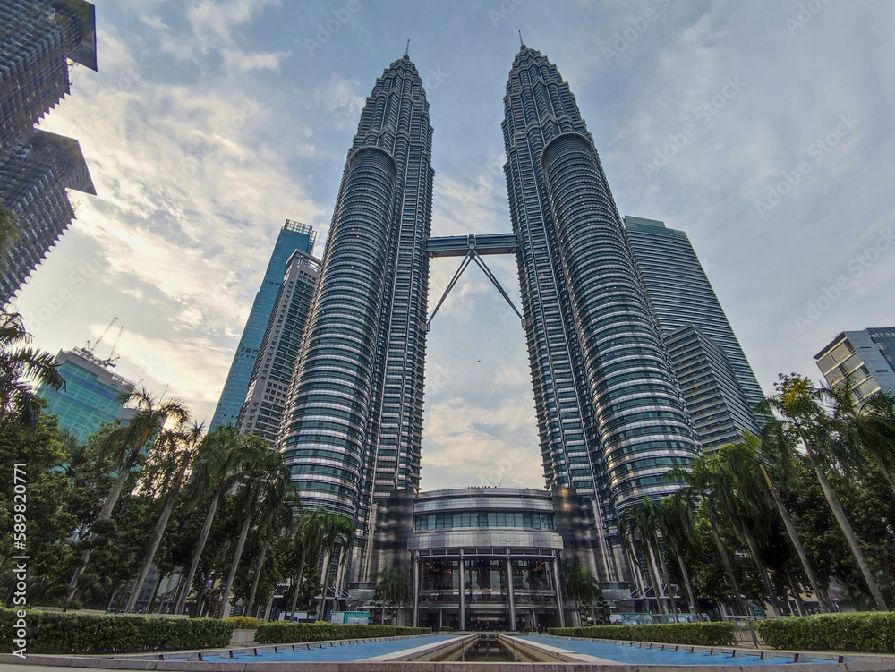 Petronas Twin Towers and KLCC Twin Towers in the city of Kuala Lumpur ...