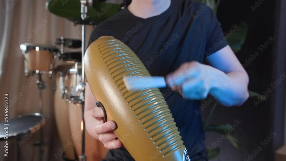 Traditional Guiro Latin percussion cuban musical instrument played by ...