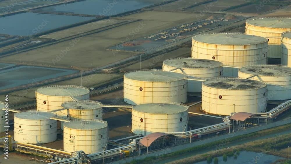 From an aerial view, an oil depot usually appears as a large industrial ...