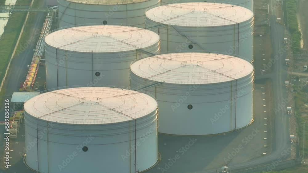 From an aerial view, an oil depot usually appears as a large industrial ...