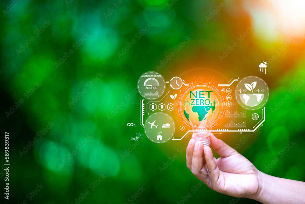 Net zero concept help reduce global warming..Hand holding natural ...