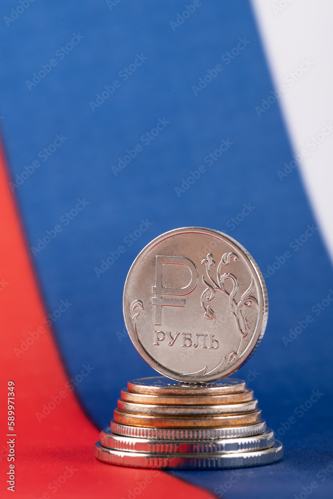 Coin with the symbol of the Russian ruble on the background of the ...