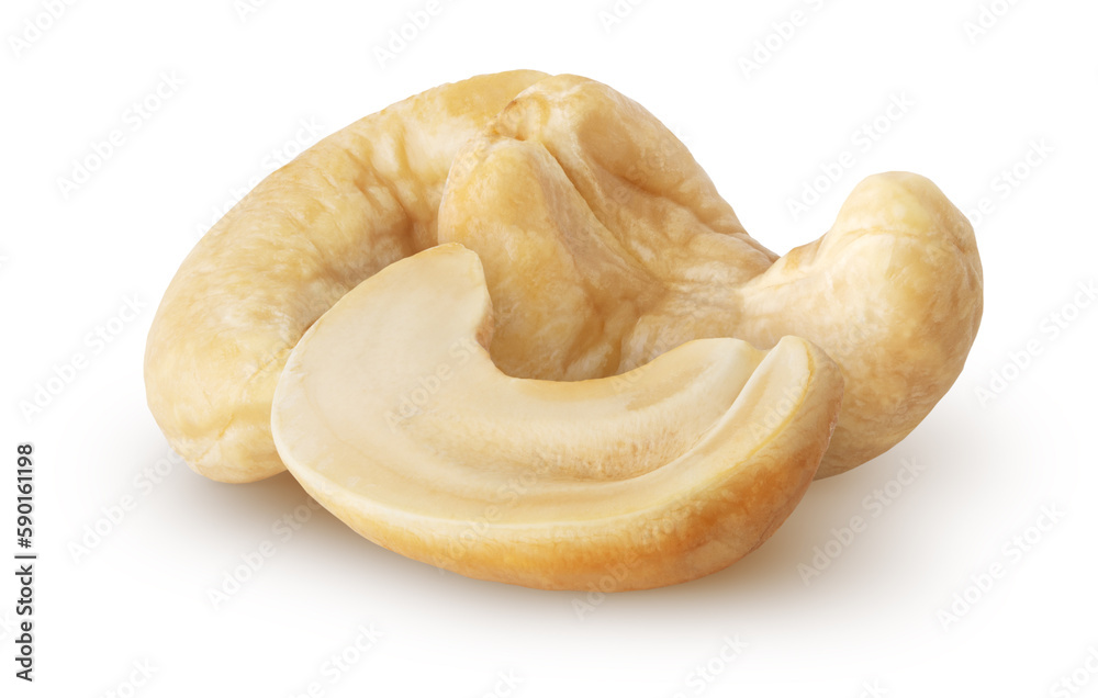 Isolated roasted cashew nuts. Two whole roasted cashew nuts and a half ...