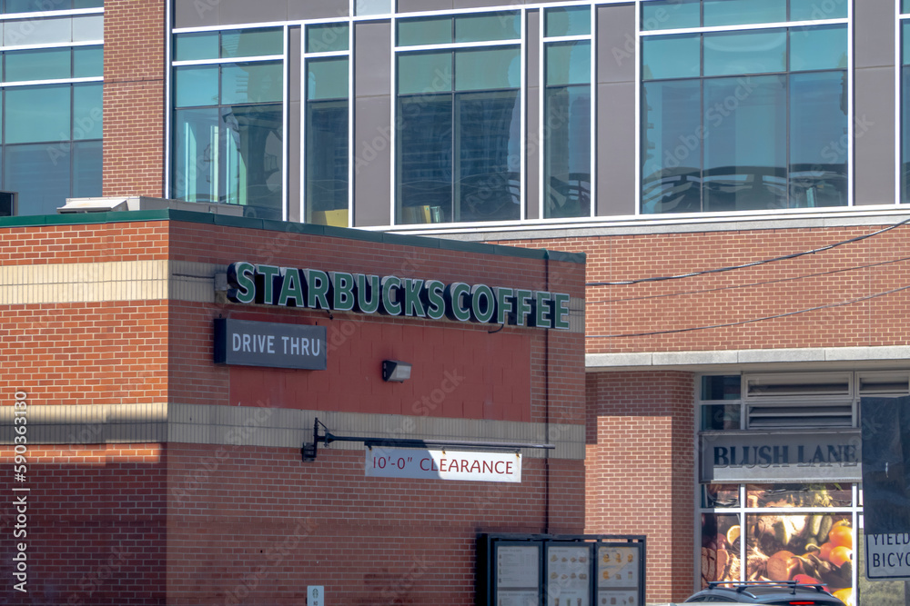 Calgary, Alberta, Canada. Apr 07, 2023. An Starbucks Coffee store sign ...