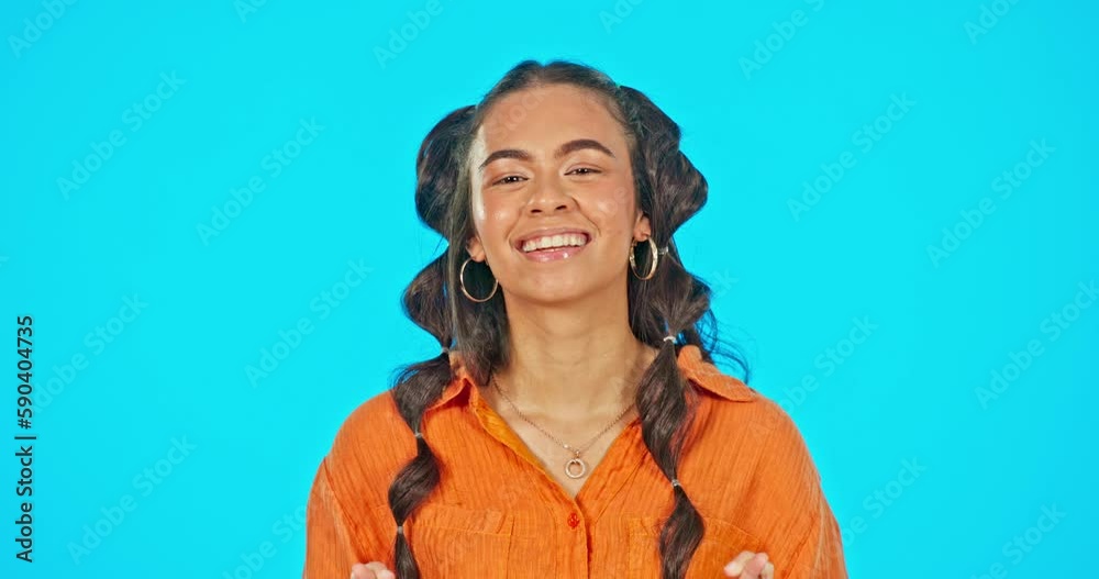 Smile, hope and woman with fingers crossed on studio backdrop with ...