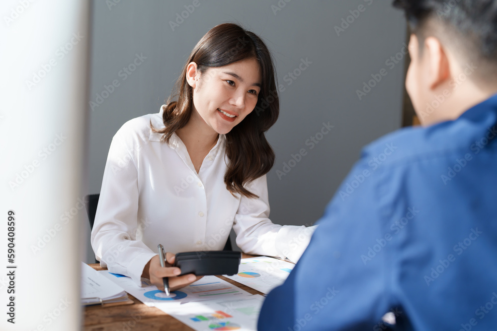 Accountant checking financial statement or counting by calculator ...