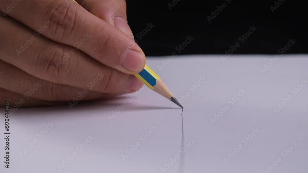 Graphite pencil drawing straight lines on white background paper ...