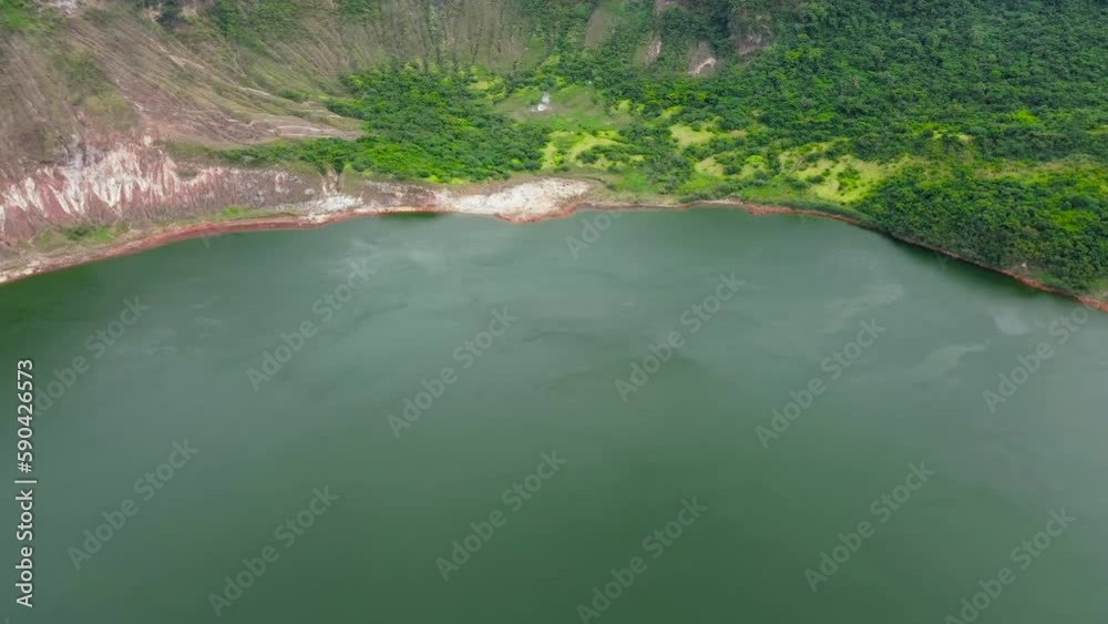 The smallest volcano in the Philippines is Taal with a green crater ...